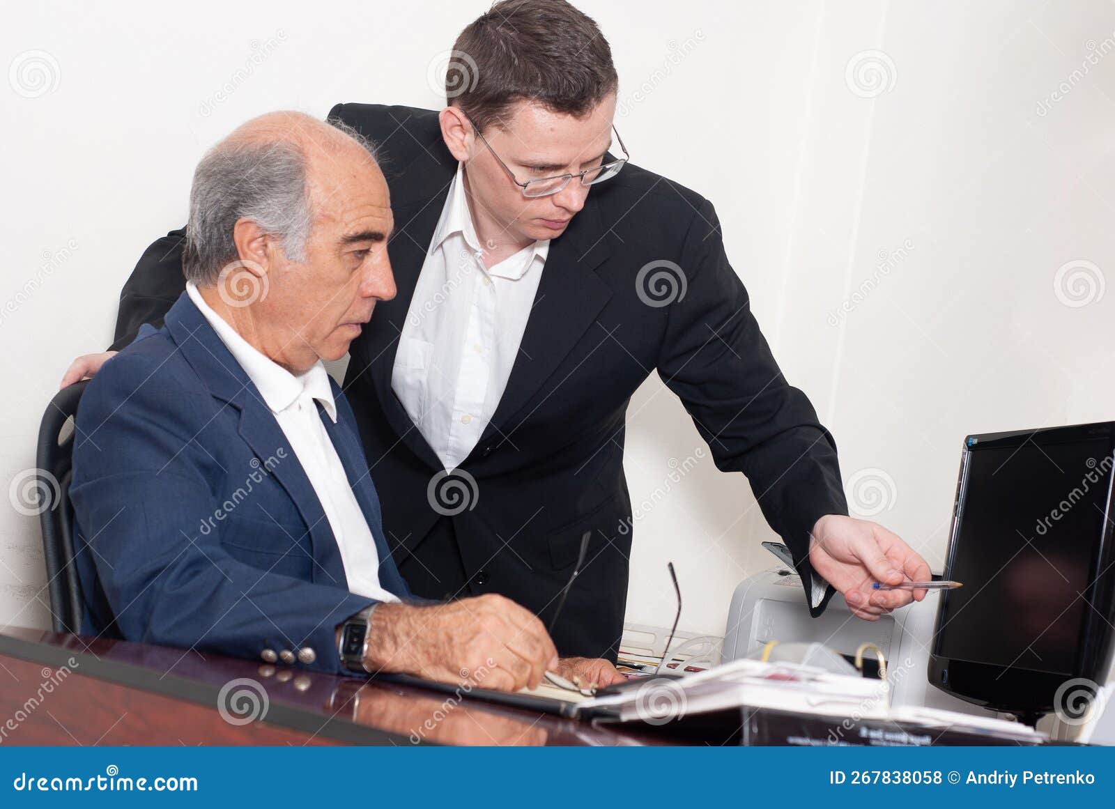 Two Male Businessmen in Their Office during Working Hours Stock Photo ...