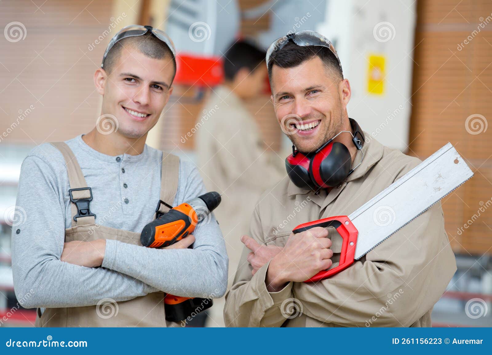 Two male carpenters posing stock image. Image of concept - 261156223