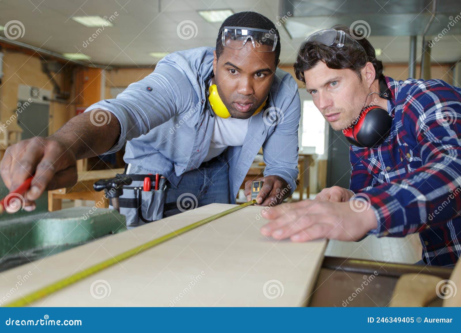 Two Male Carpenters Working Together in Workshop Stock Image - Image of ...