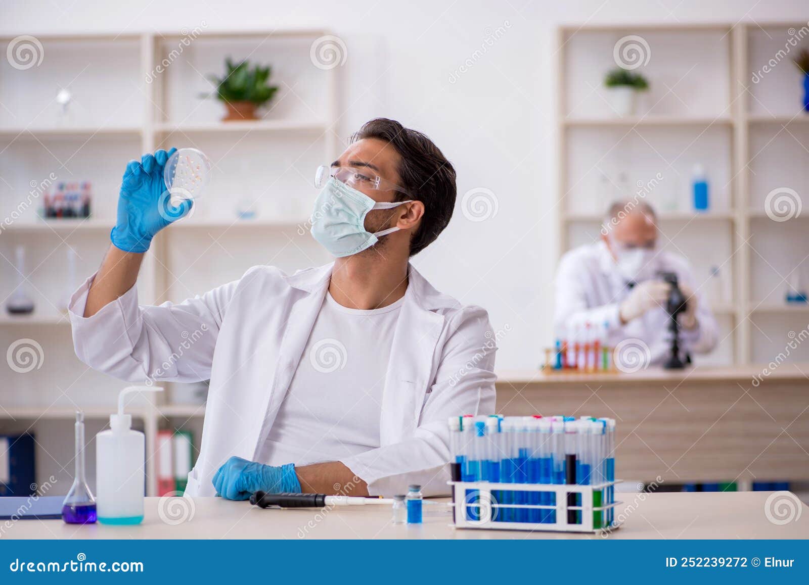 Two Male Chemist Working at the Lab Stock Photo - Image of chemist ...