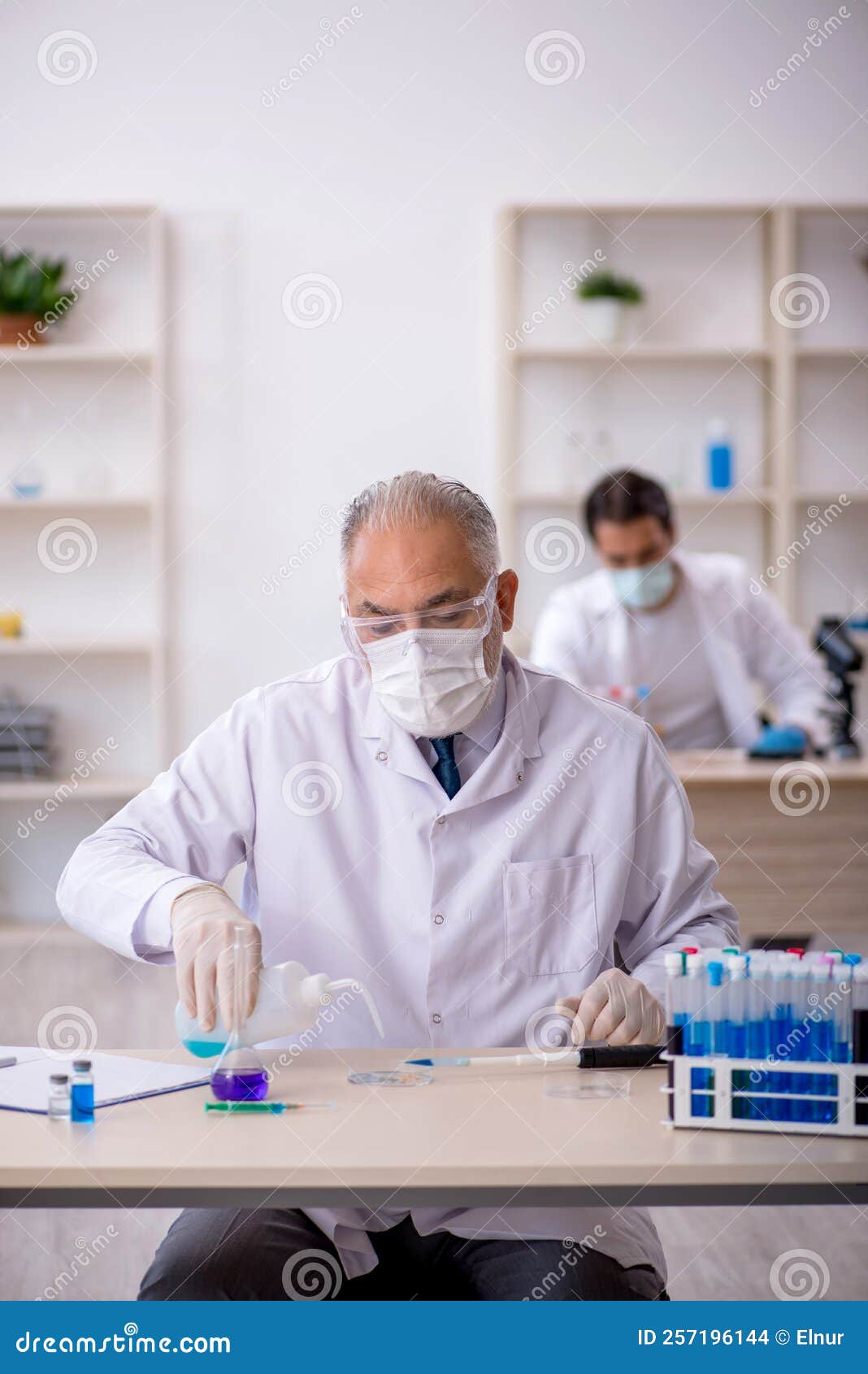 Two Male Chemist Working at the Lab Stock Photo - Image of teamwork ...