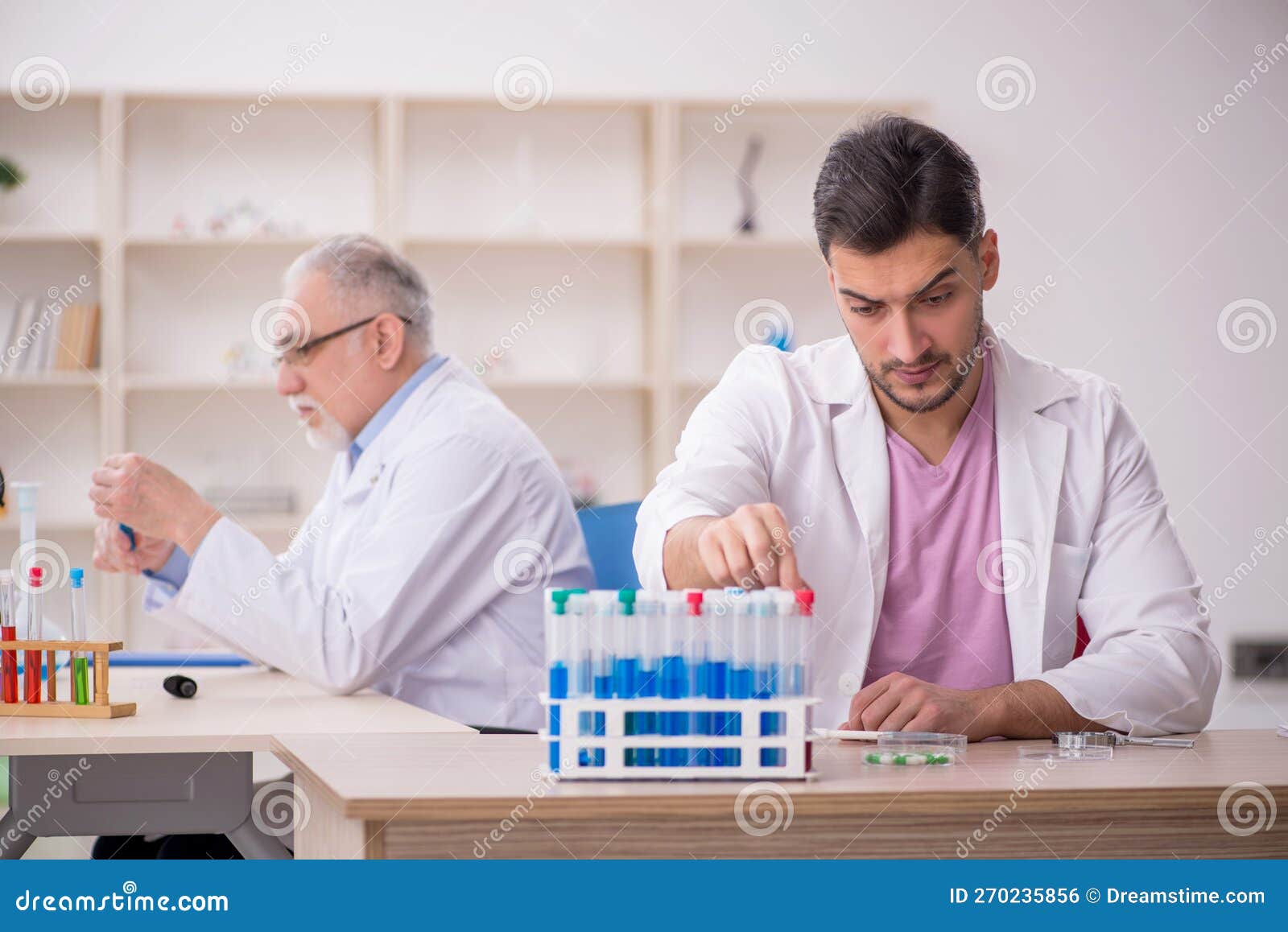 Two Male Chemists Working at the Lab Stock Photo - Image of ...