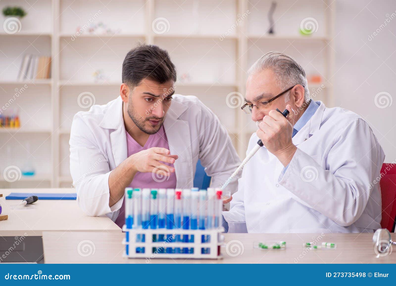 Two Male Chemists Working at the Lab Stock Photo - Image of working ...