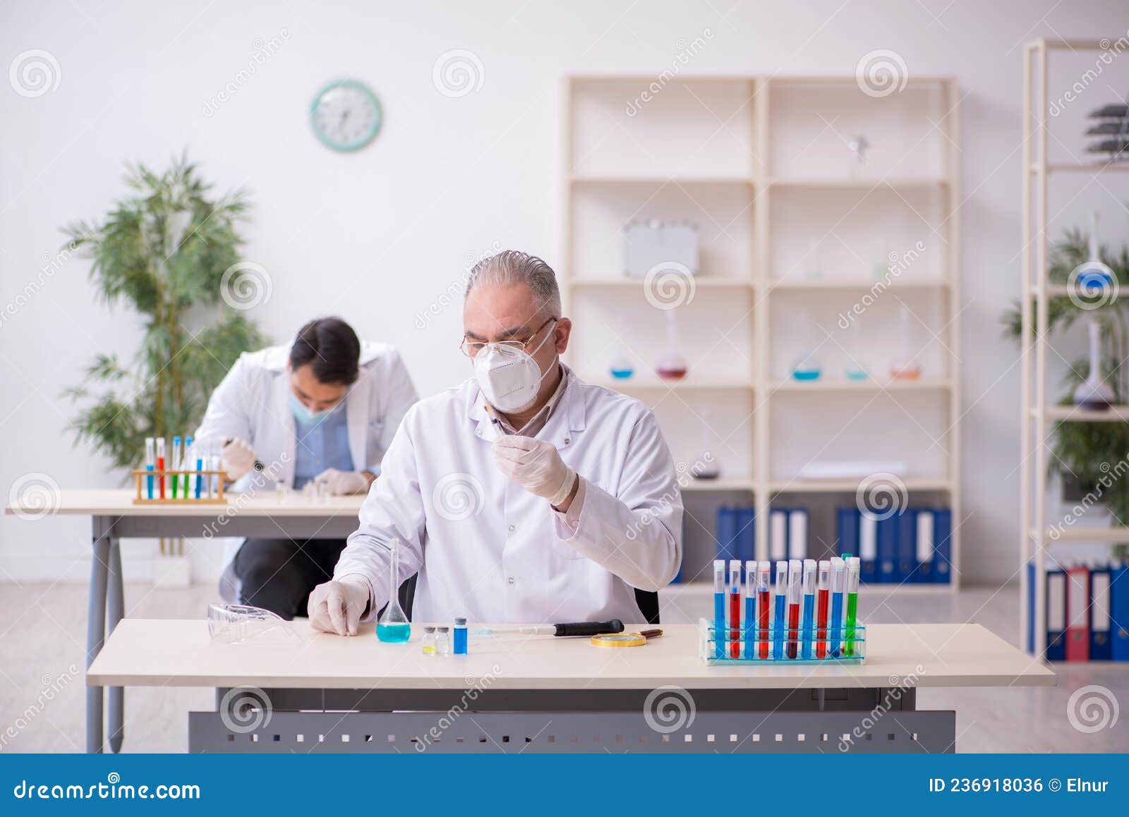 Two Male Chemists Working at the Lab during Pandemic Stock Photo ...