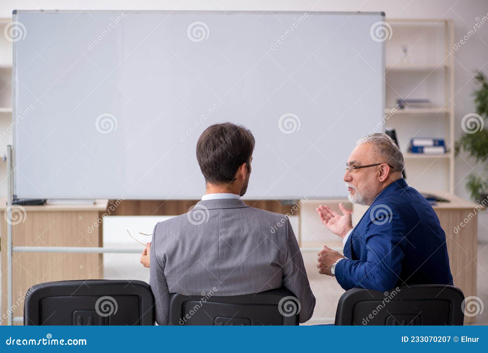 Two Male Colleagues in Business Presentation Concept Stock Image ...