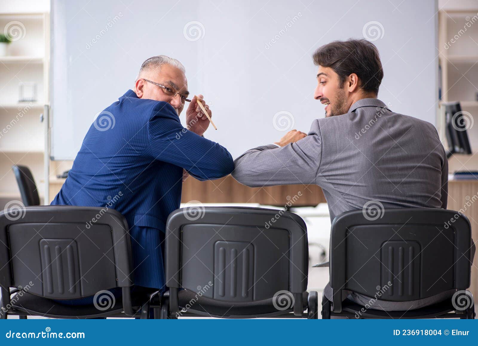 Two Male Colleagues in Business Presentation Concept Stock Photo ...