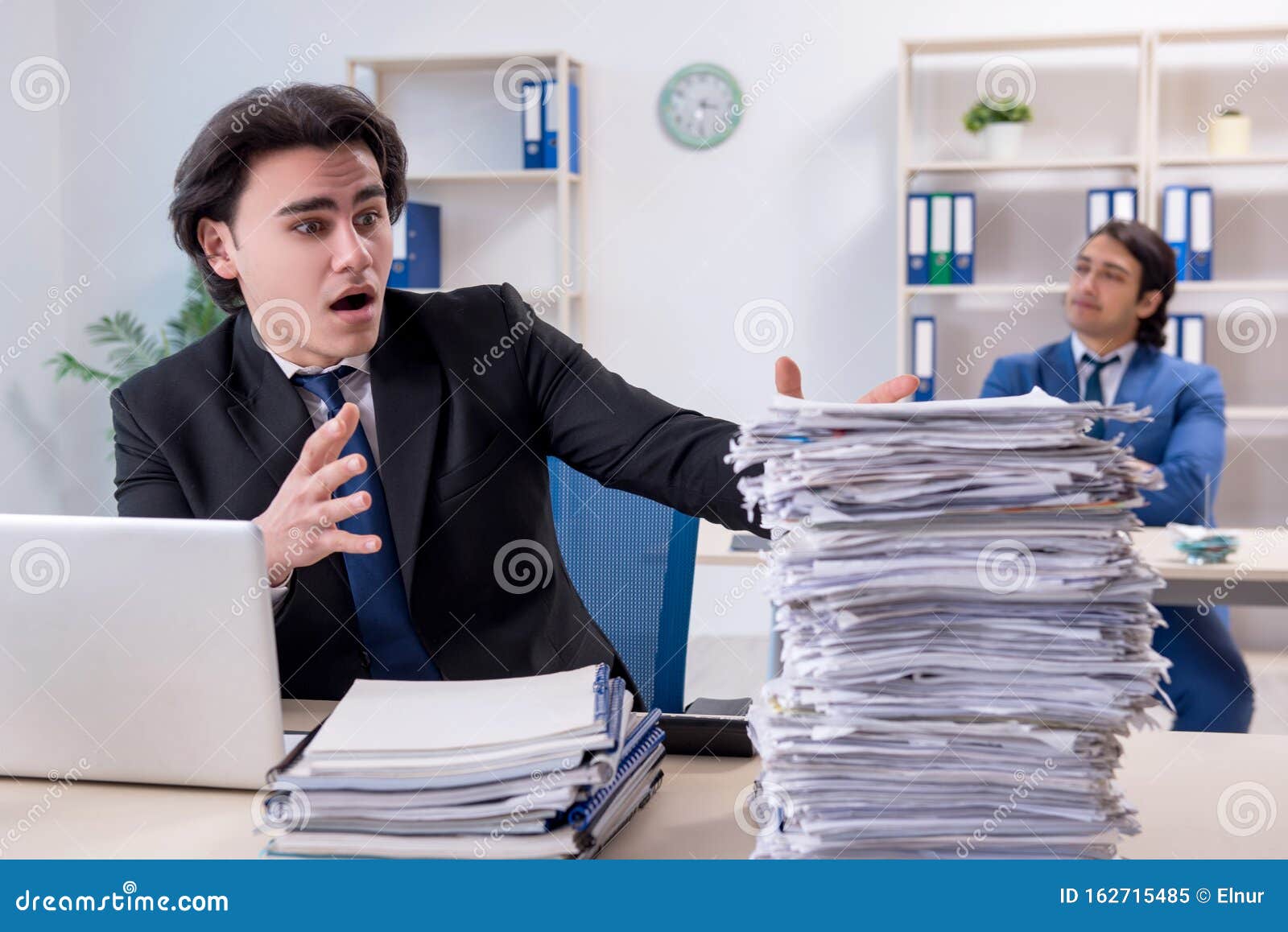 Two Male Colleagues Unhappy with Excessive Work Stock Image - Image of ...