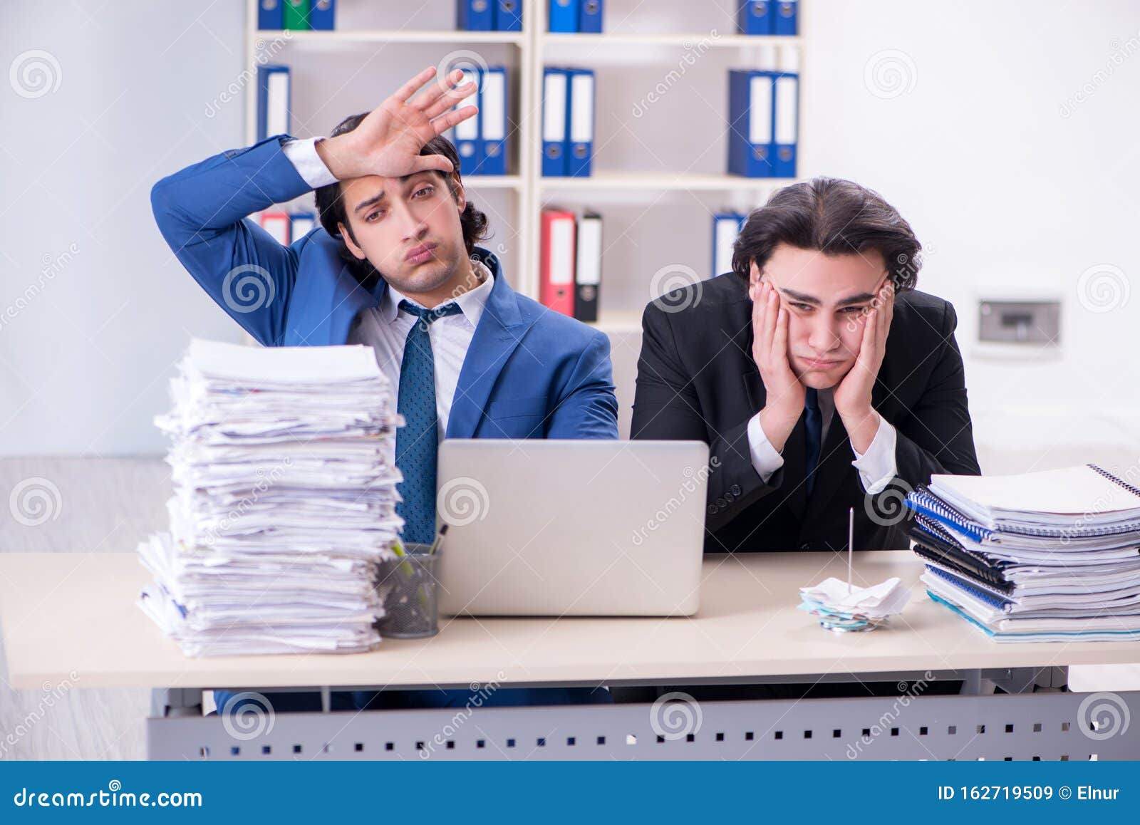 Two Male Colleagues Unhappy with Excessive Work Stock Image - Image of ...