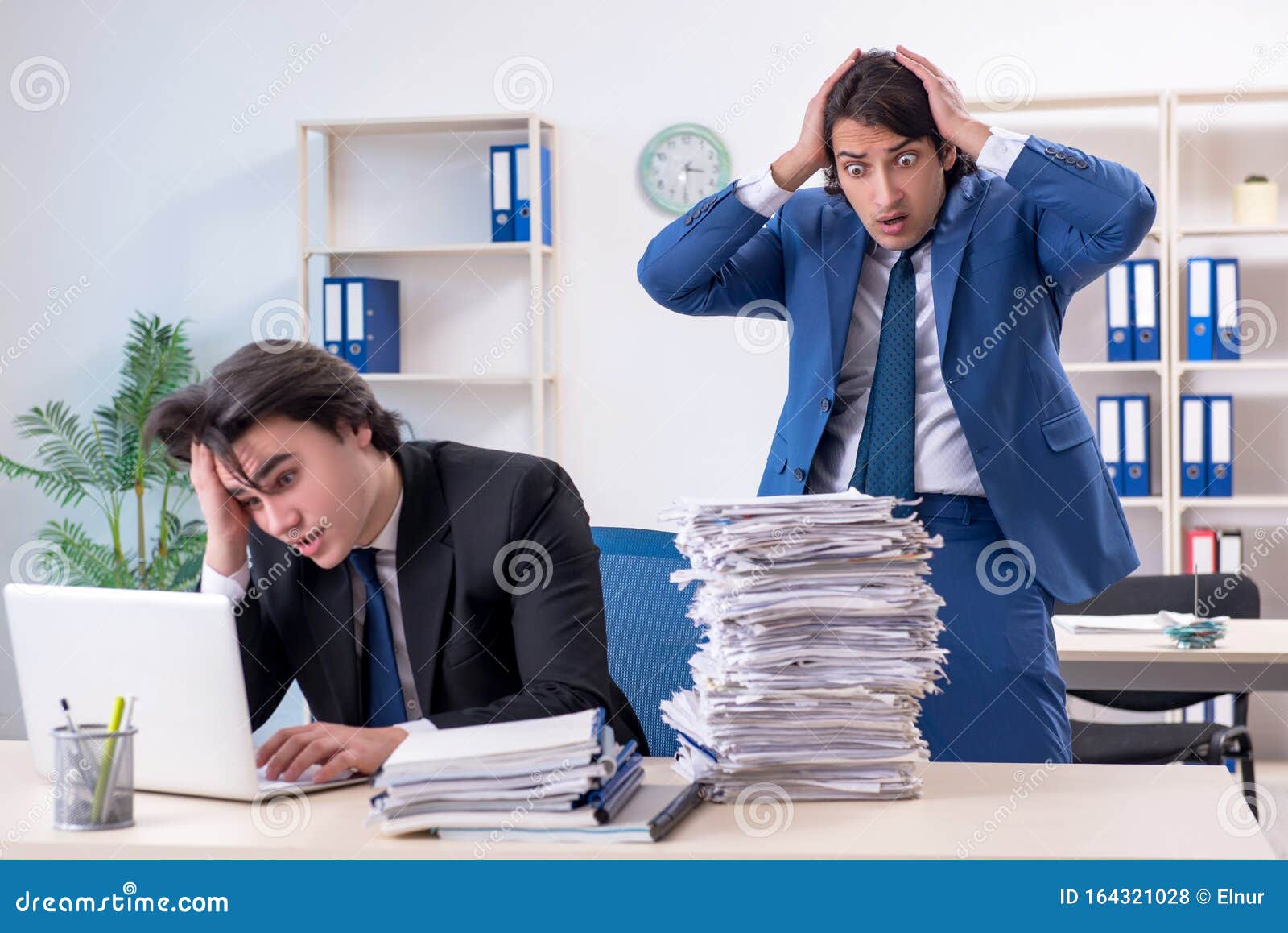 Two Male Colleagues Unhappy with Excessive Work Stock Photo - Image of ...