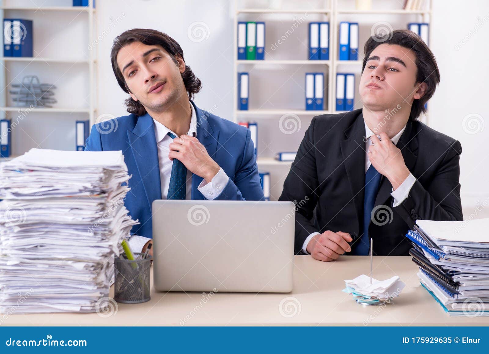 Two Male Colleagues Unhappy with Excessive Work Stock Image - Image of ...