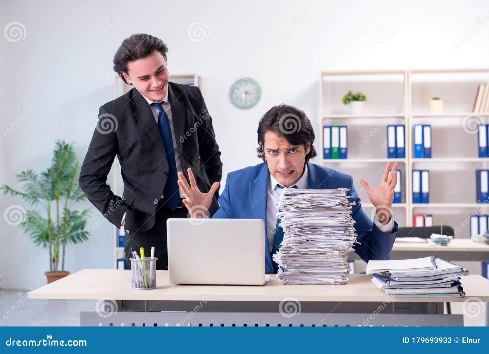 Two Male Colleagues Unhappy with Excessive Work Stock Image - Image of ...