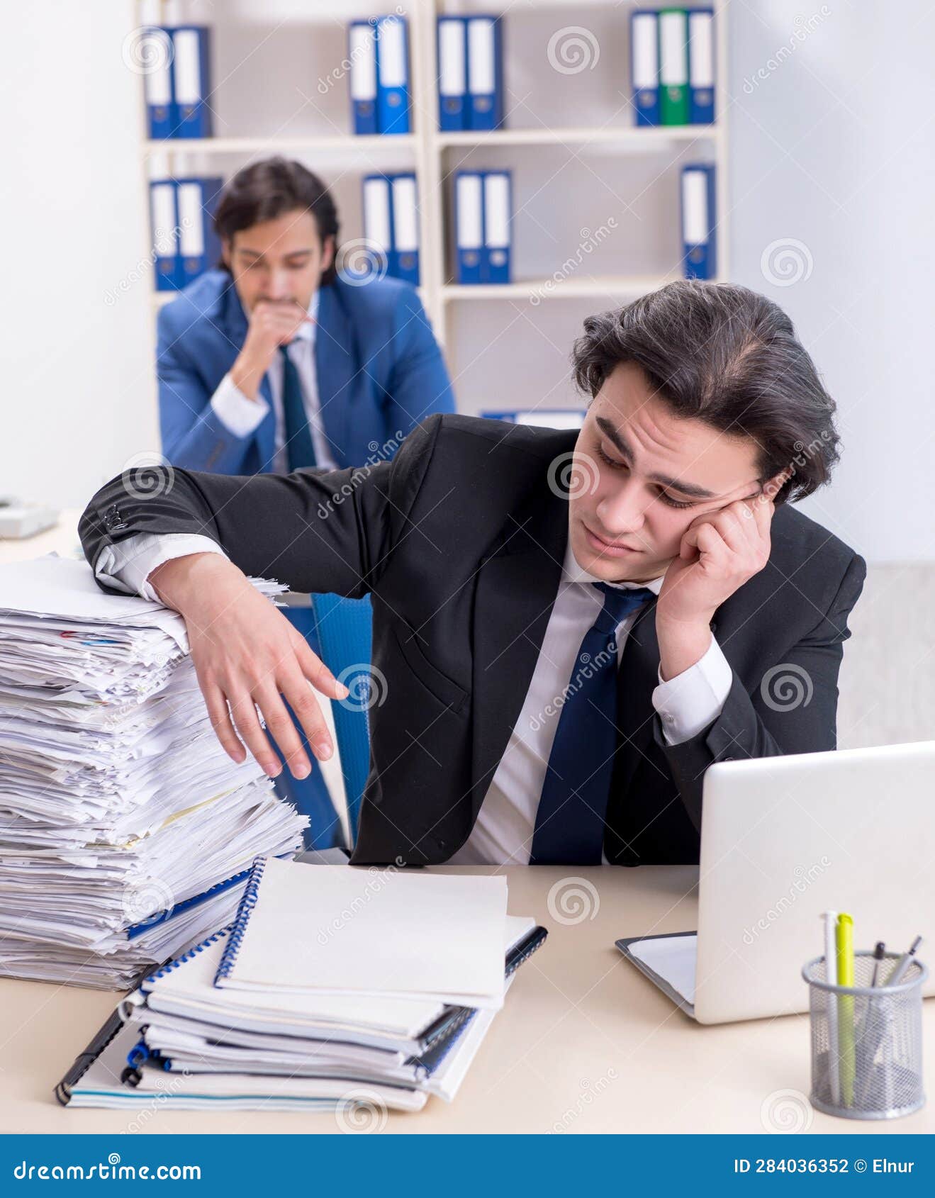 Two Male Colleagues Unhappy with Excessive Work Stock Photo - Image of ...