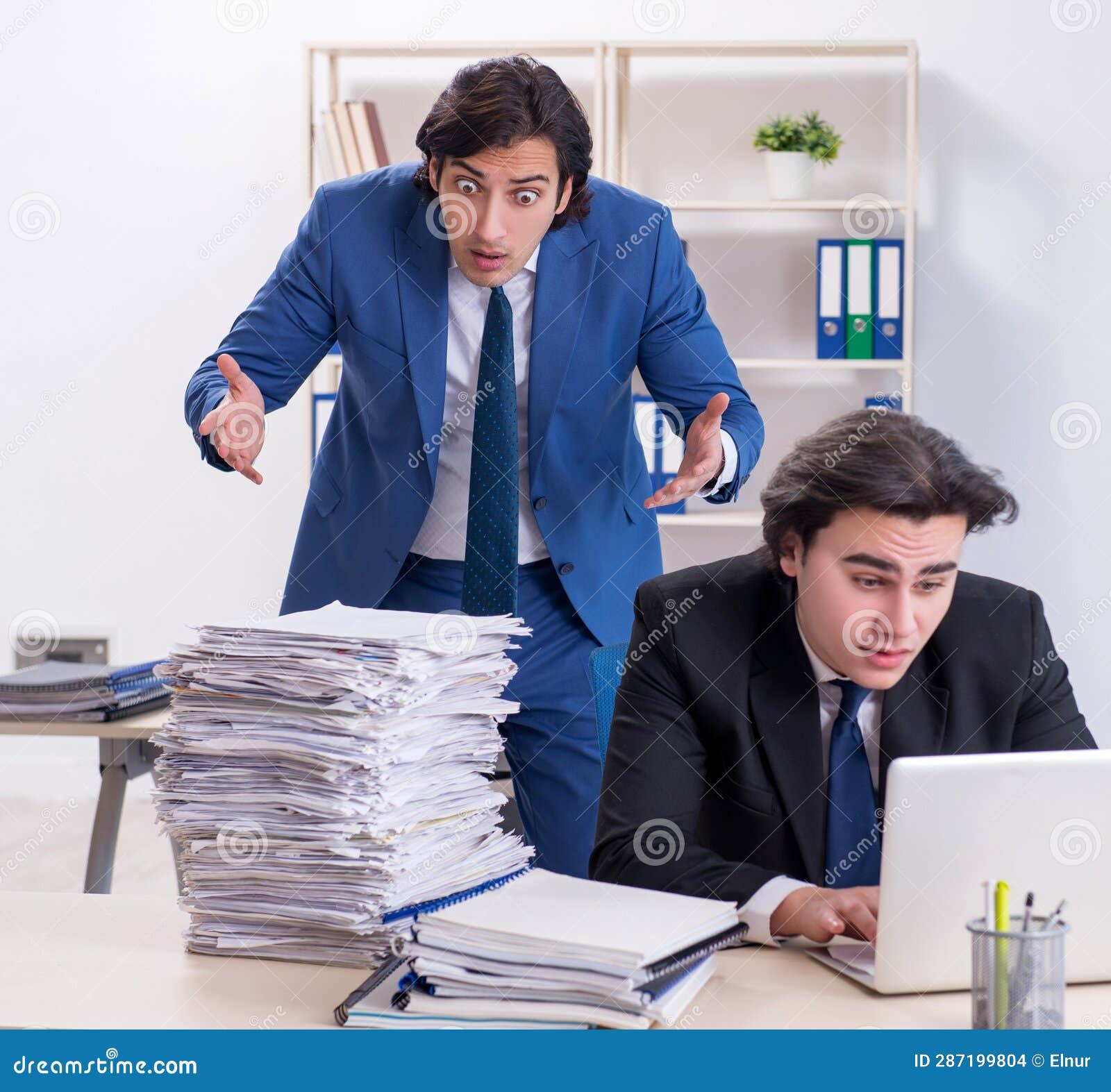 Two Male Colleagues Unhappy with Excessive Work Stock Photo - Image of ...