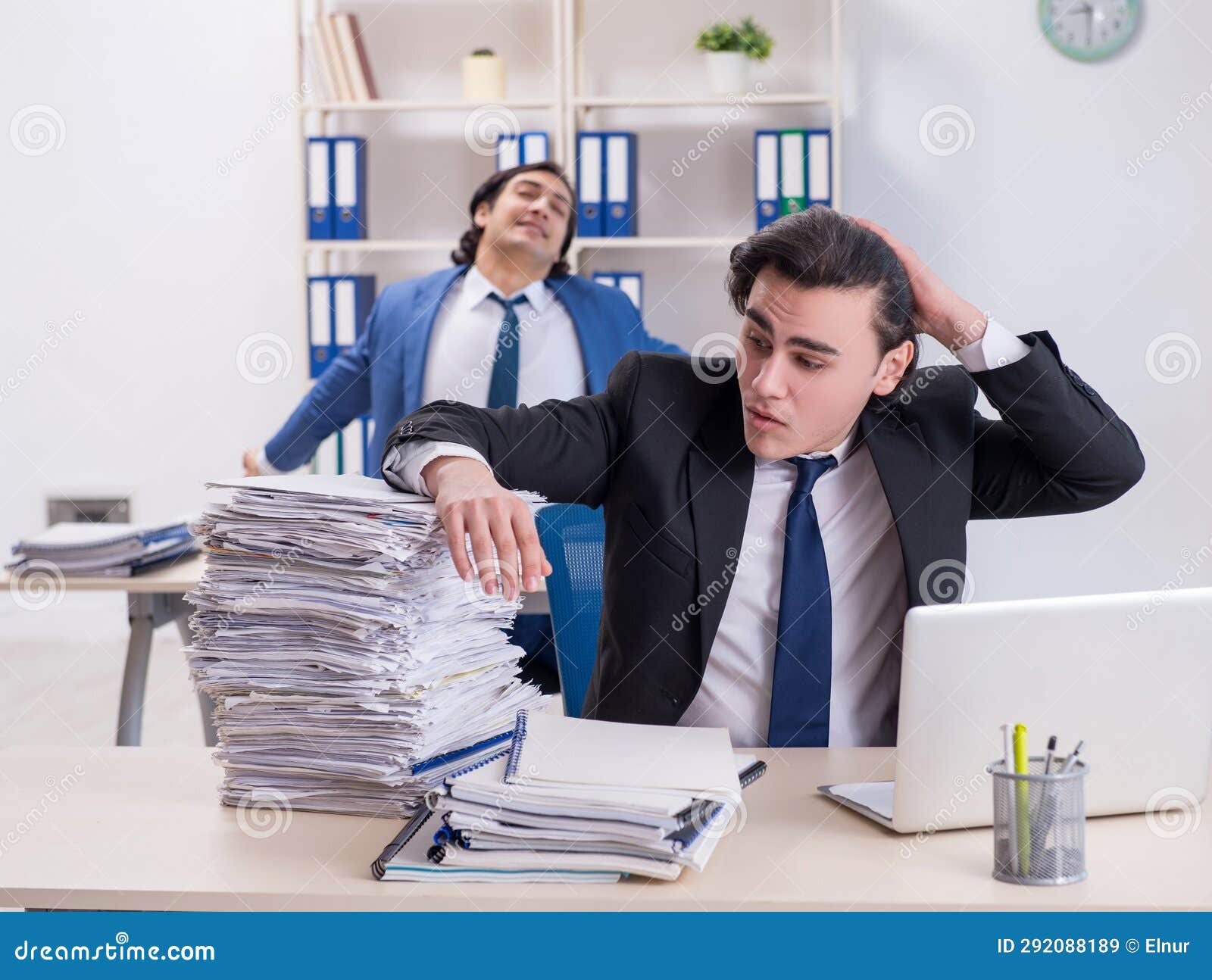 Two Male Colleagues Unhappy with Excessive Work Stock Image - Image of ...