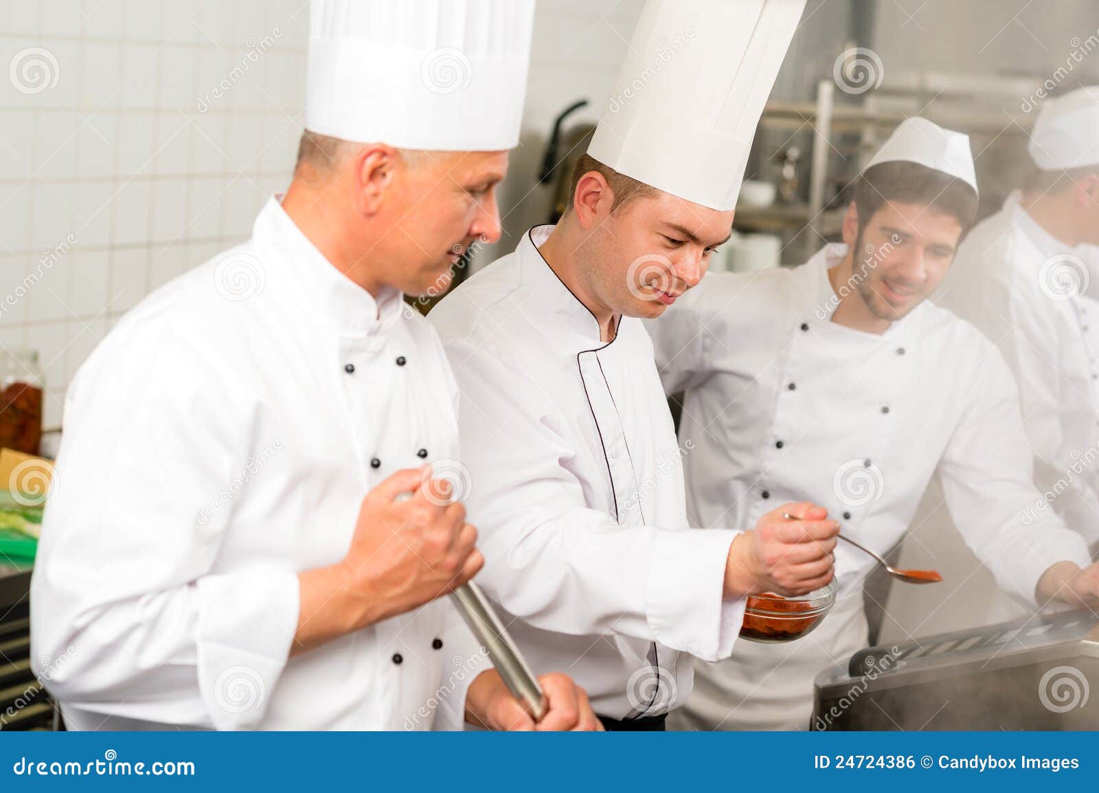 Two Male Cook Work in Professional Kitchen Stock Photo - Image of ...