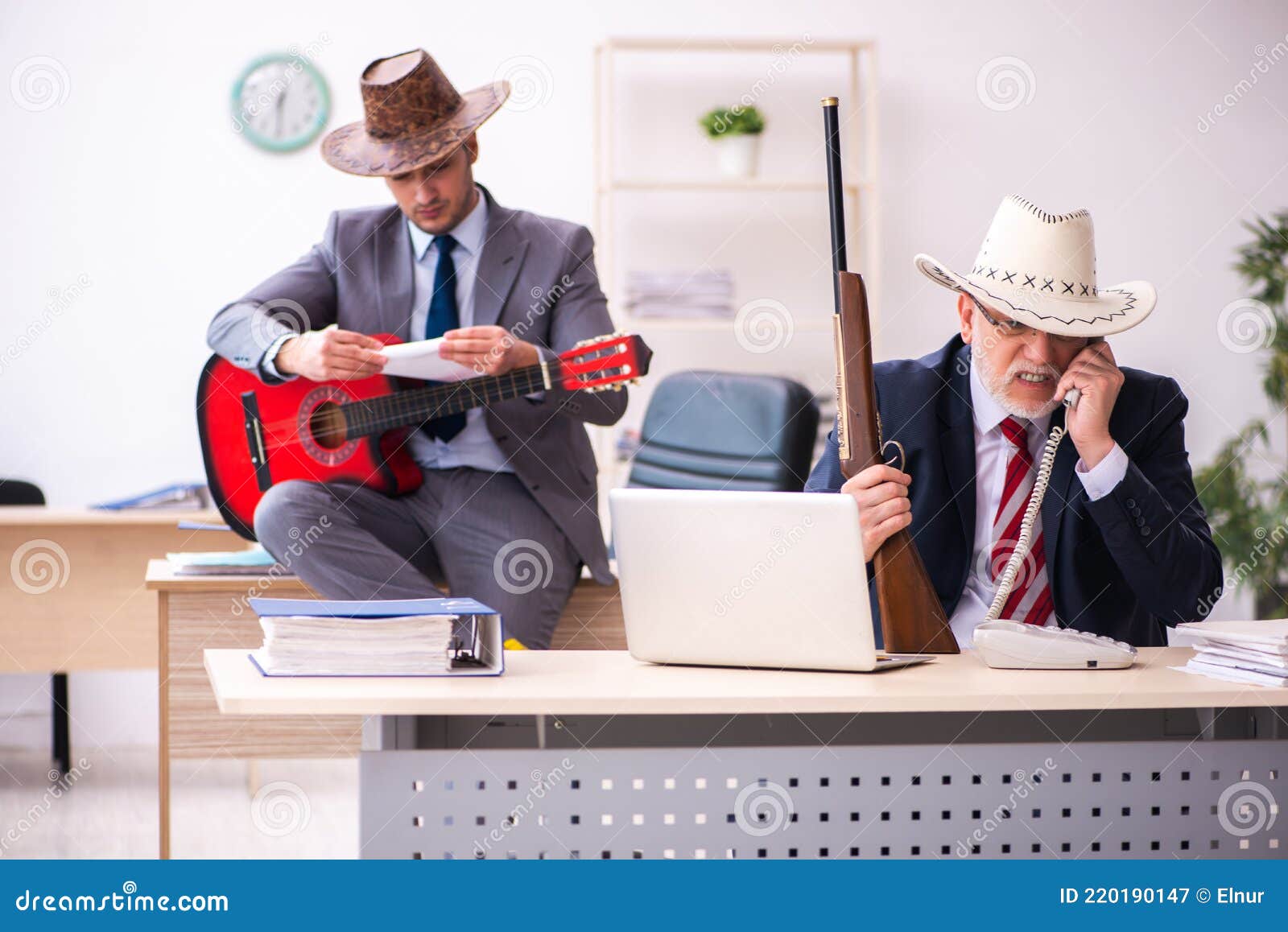 Two Male Cowboy Employees in Funny Concept Stock Image - Image of ...