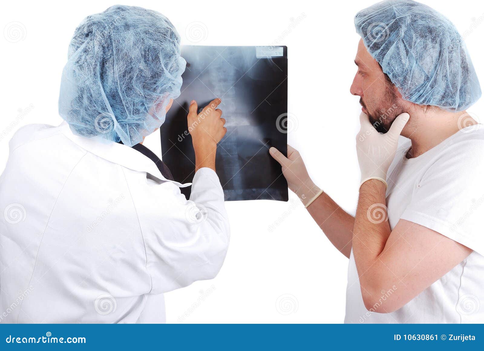 Two Male Doctors Looking at Scan Image Stock Image - Image of close ...