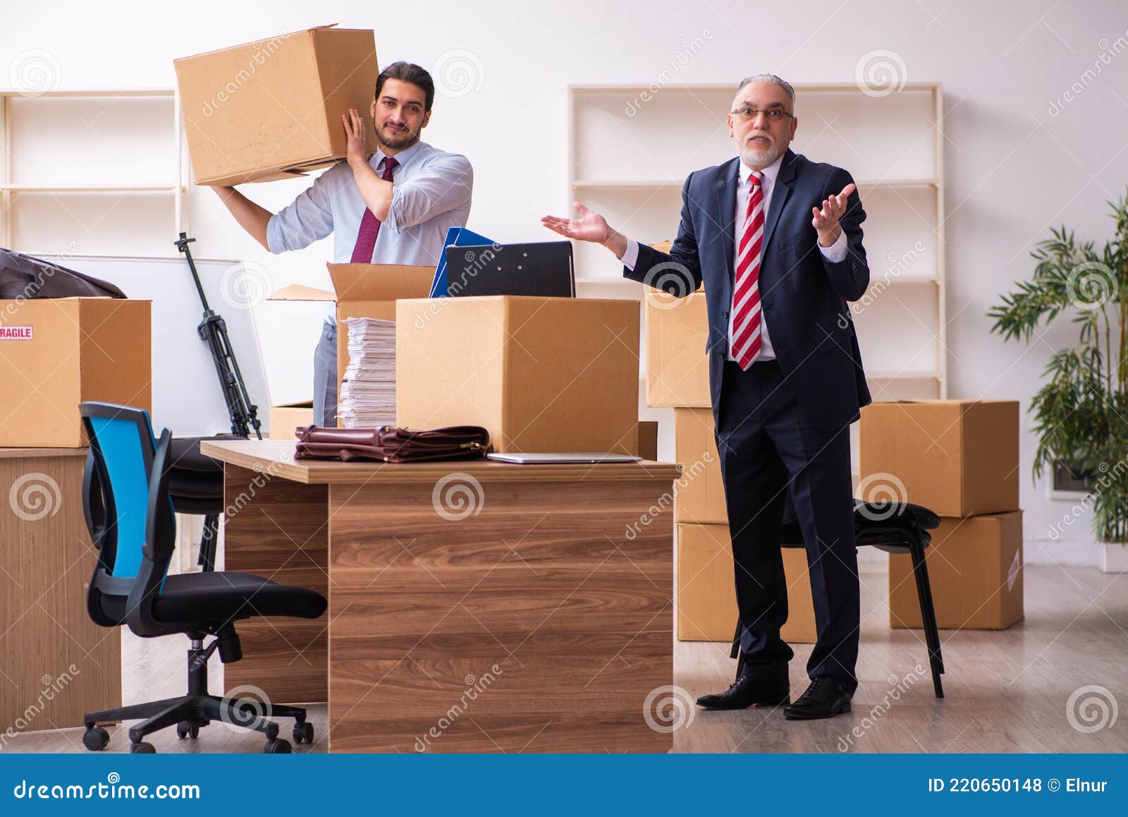 Two Male Employees in Relocation Concept Stock Photo - Image of ...
