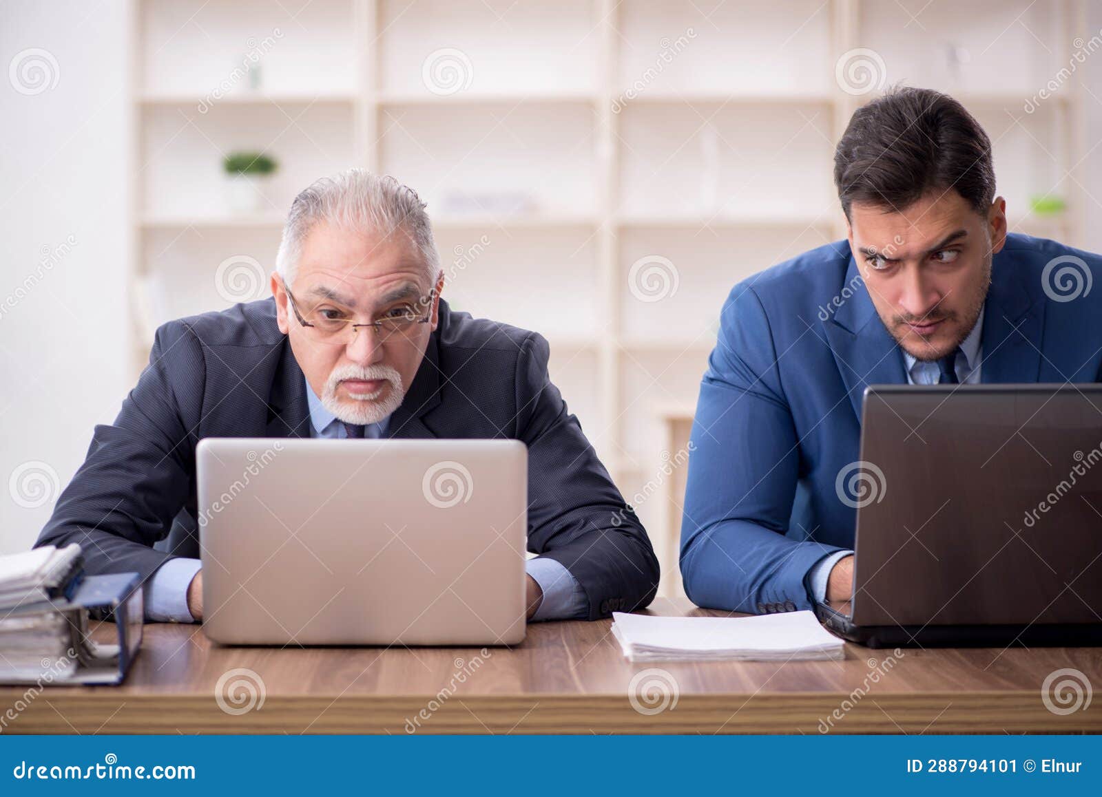 Two Male Employees Working in the Office Stock Image - Image of ...