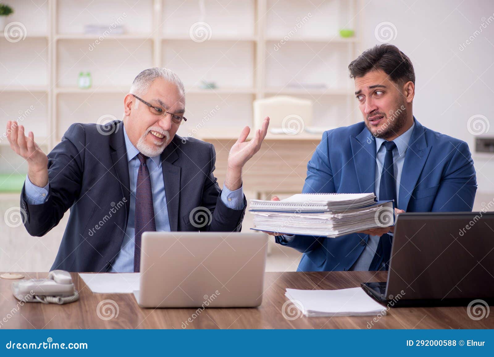 Two Male Employees Working in the Office Stock Photo - Image of ...