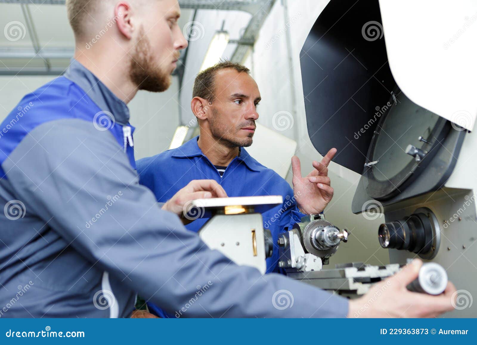 Two Male Engineers Using Equipment Stock Image - Image of learning ...