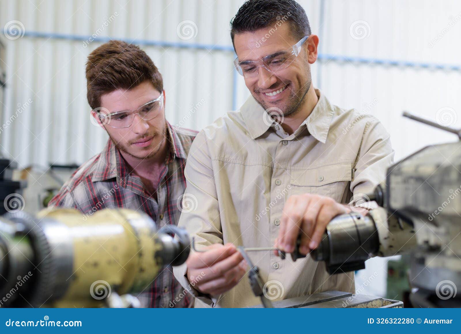 Two male machinist at work stock photo. Image of lorry - 326322280
