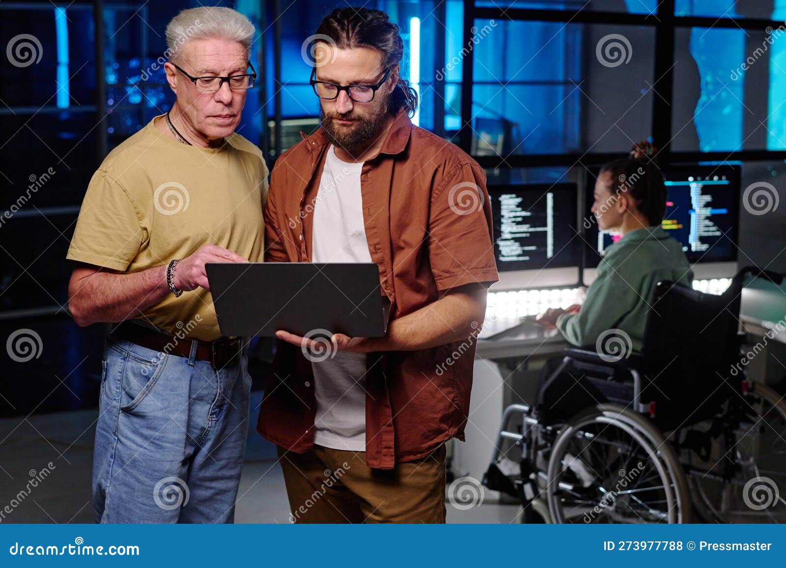 Two Male it Managers Looking at Laptop Screen during Presentation Stock ...