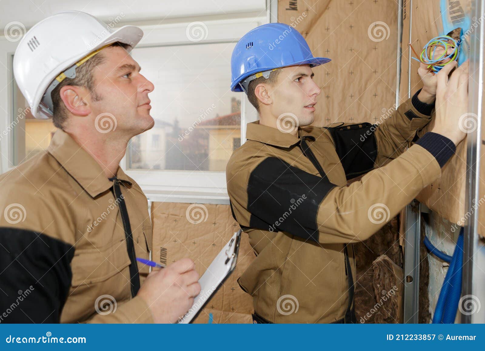 Two male plumber at work stock image. Image of white - 212233857