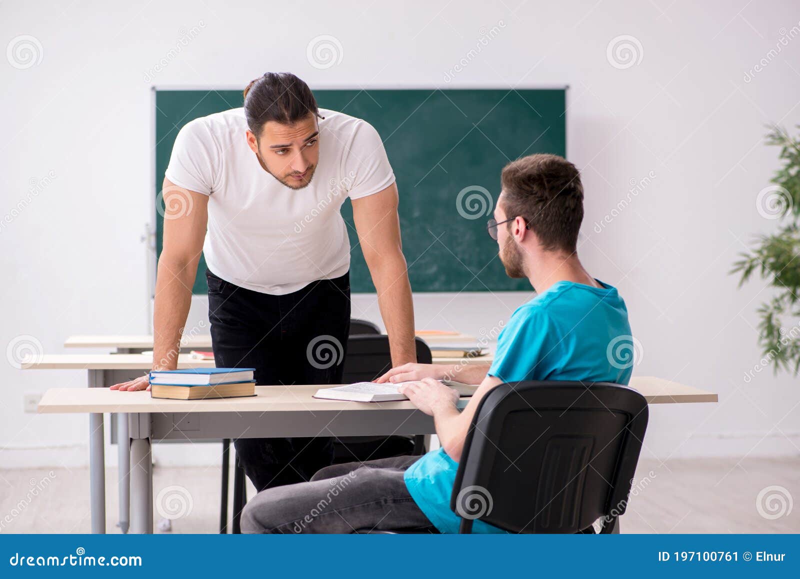Two Male Pupils in Bullying Concept in the Classroom Stock Image ...