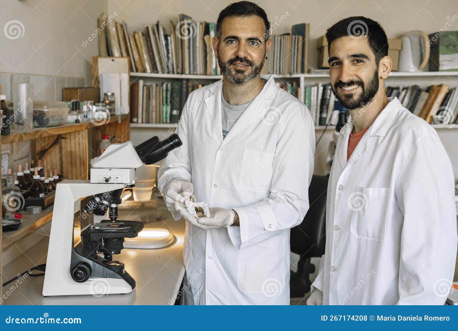 Two Male Scientists Looking at Camera and Smiling in Lab Coat Stock ...