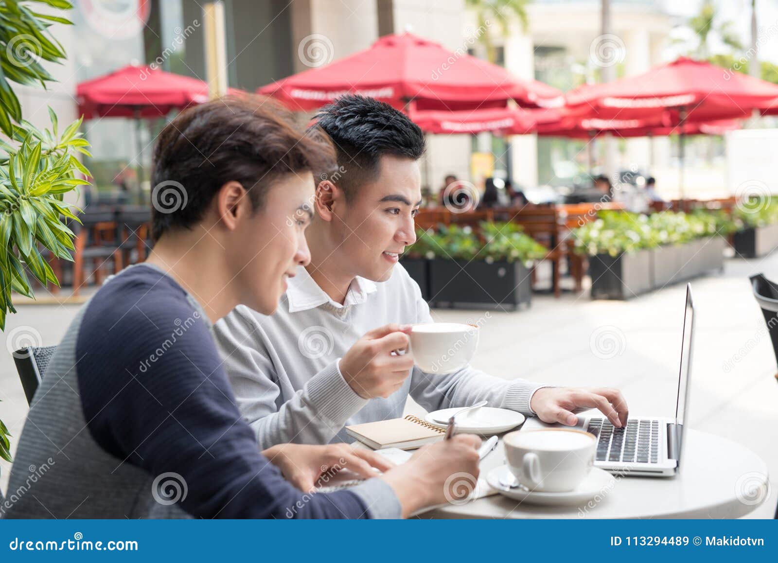 Two Male Student Learning or Entrepreneur Working Together. Stock Image ... Two Male Student Learning or Entrepreneur Working Together. Stock Image ...