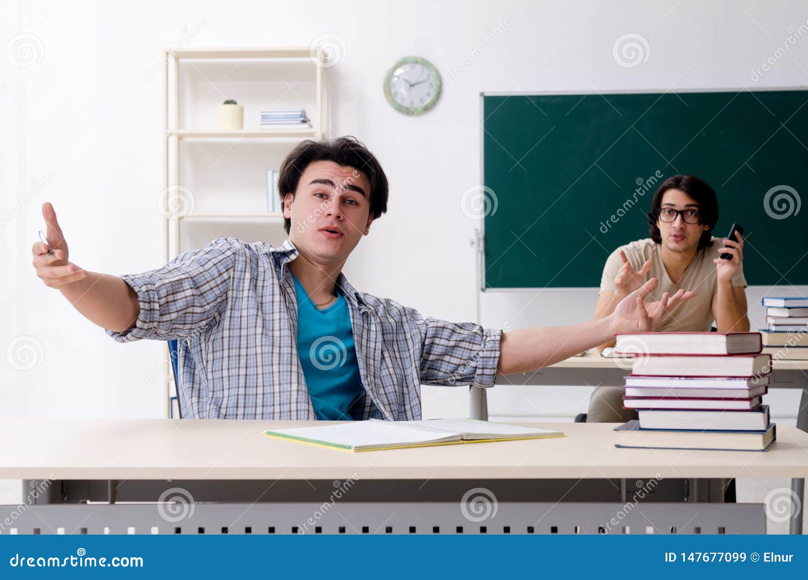 The Two Male Students in the Classroom Stock Image - Image of book ...