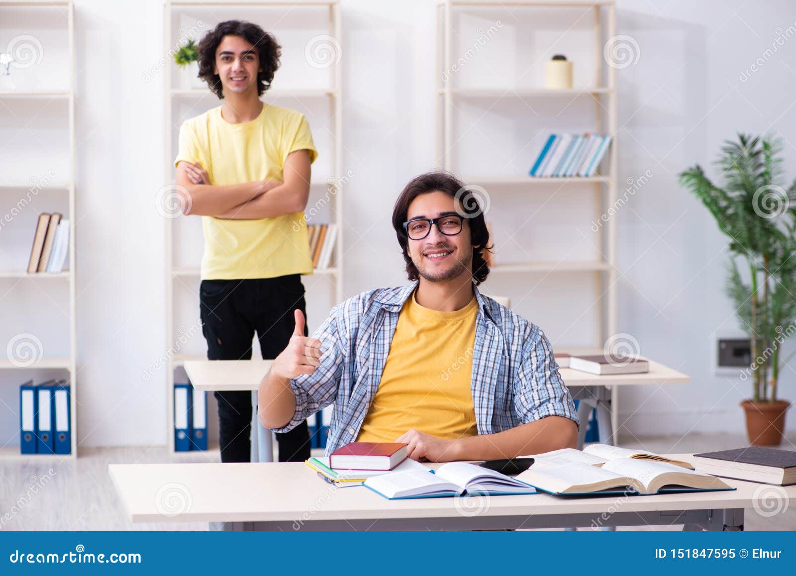 Two Male Students in the Classroom Stock Image - Image of graduating ...