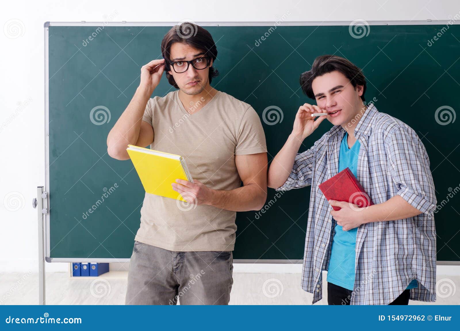Two Male Students in the Classroom Stock Photo - Image of board, high ...