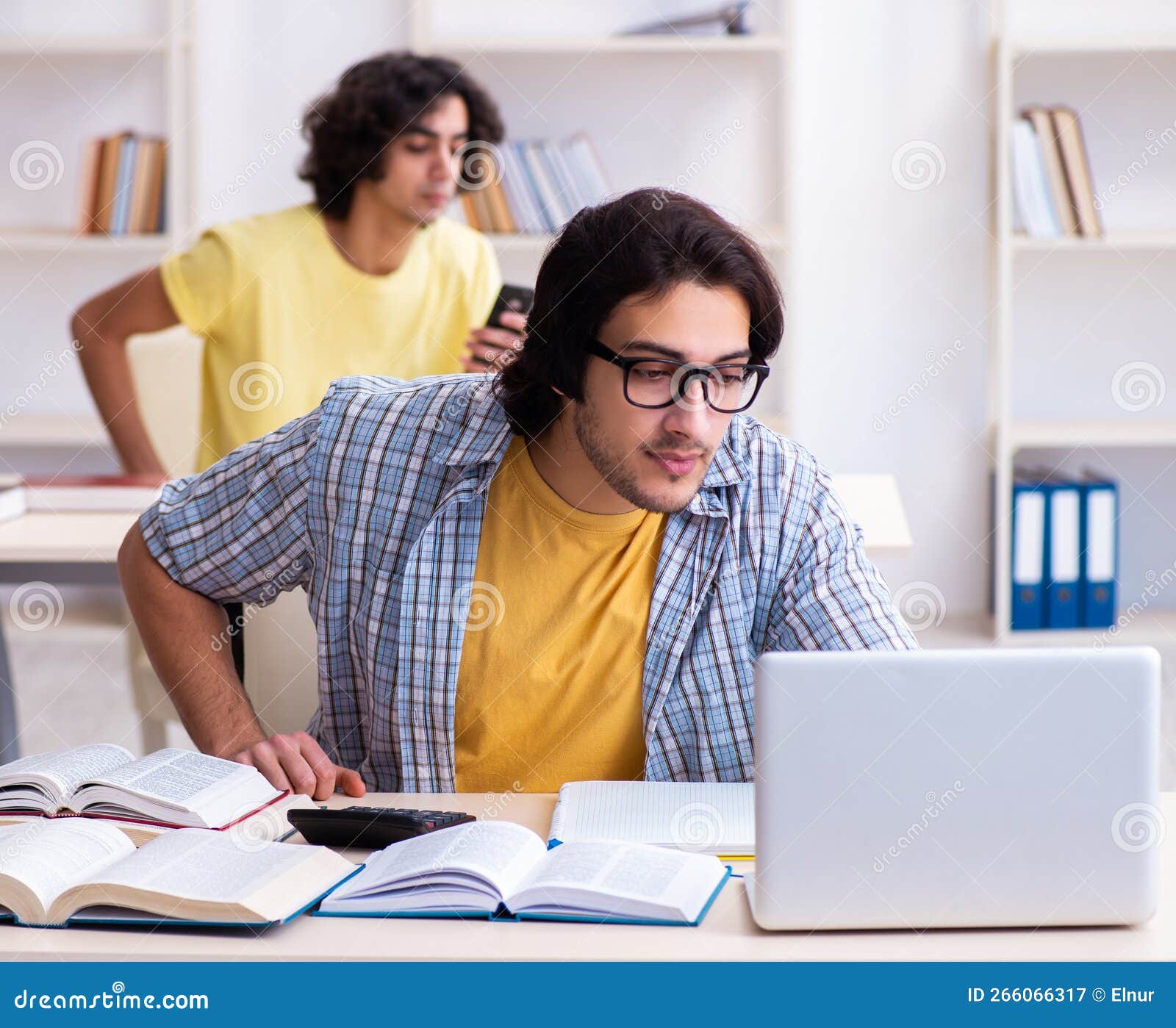 Two Male Students in the Classroom Stock Image - Image of graduating ...