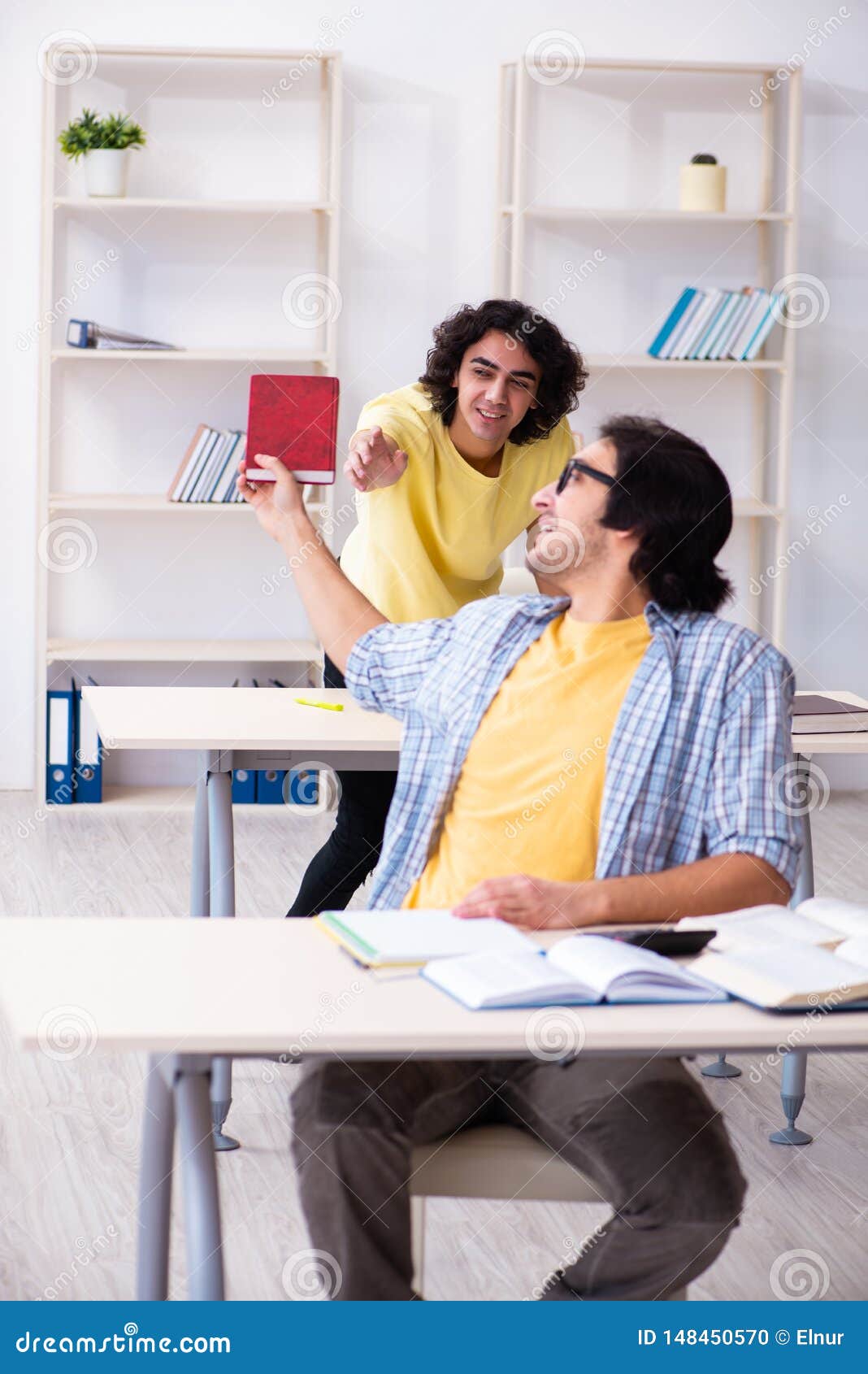 The Two Male Students in the Classroom Stock Photo - Image of ...