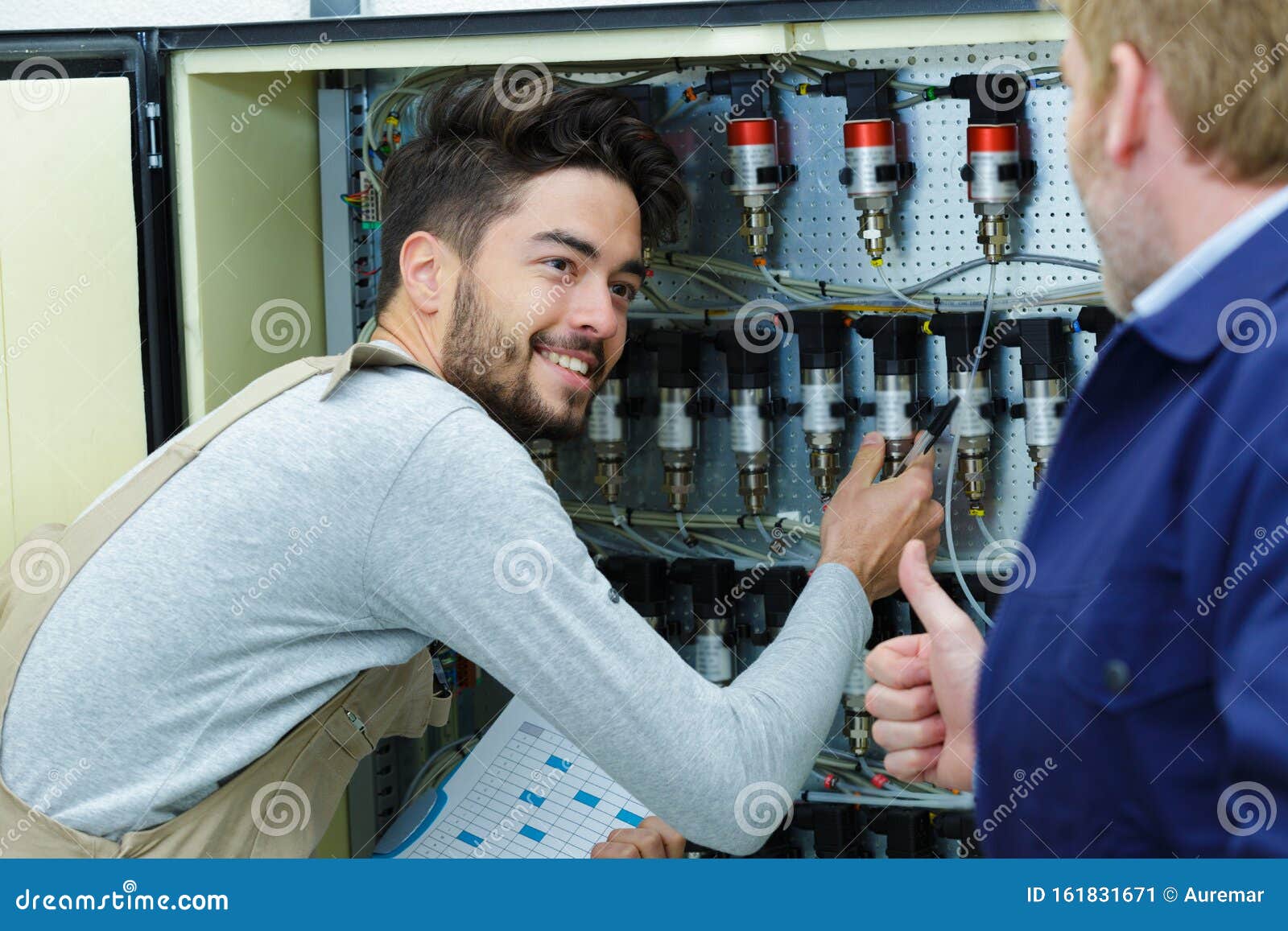 Two Male Technician Doing Maintenance on Electric Machine Stock Image ...