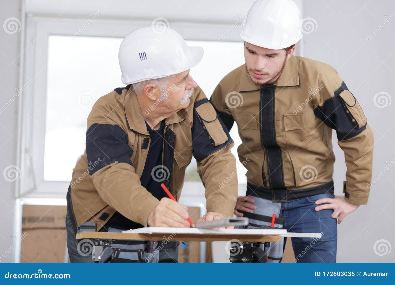 Two Male Workers Working on Workbench Stock Image - Image of craftsman ...