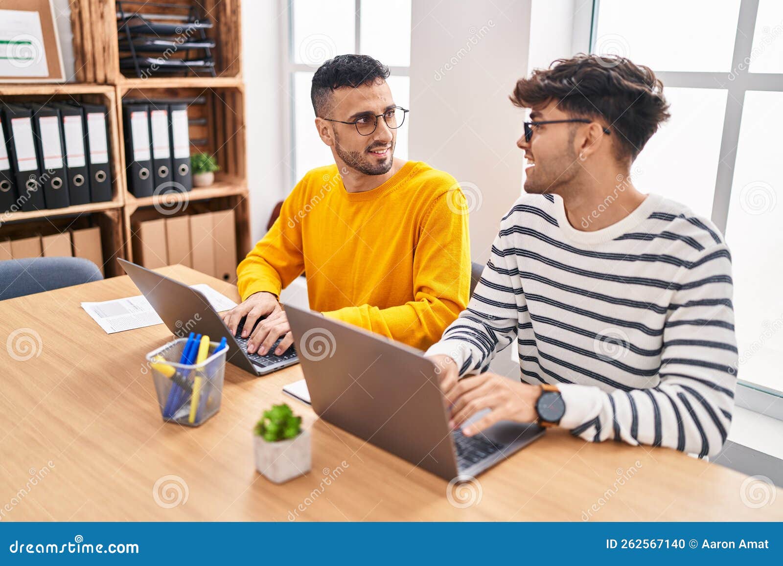 Two Man Business Workers Using Laptop Working at Office Stock Photo ...