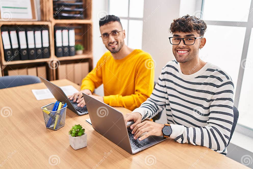Two Man Business Workers Using Laptop Working at Office Stock Photo ...