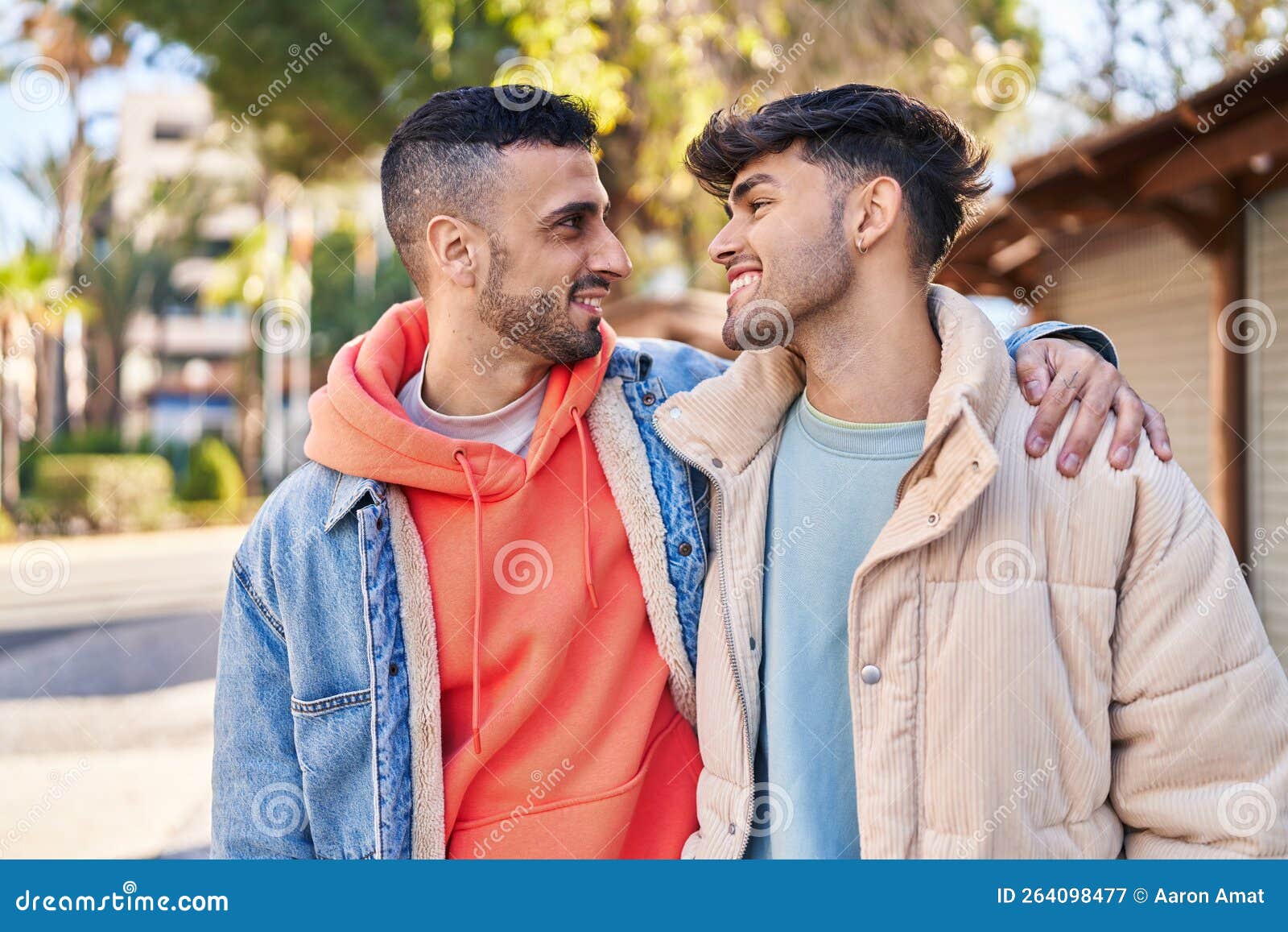 Two Man Couple Hugging Each Other Standing at Park Stock Image - Image ...