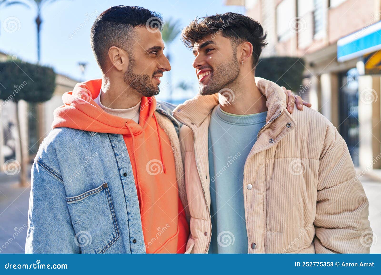 Two Man Couple Hugging Each Other Standing at Street Stock Photo ...