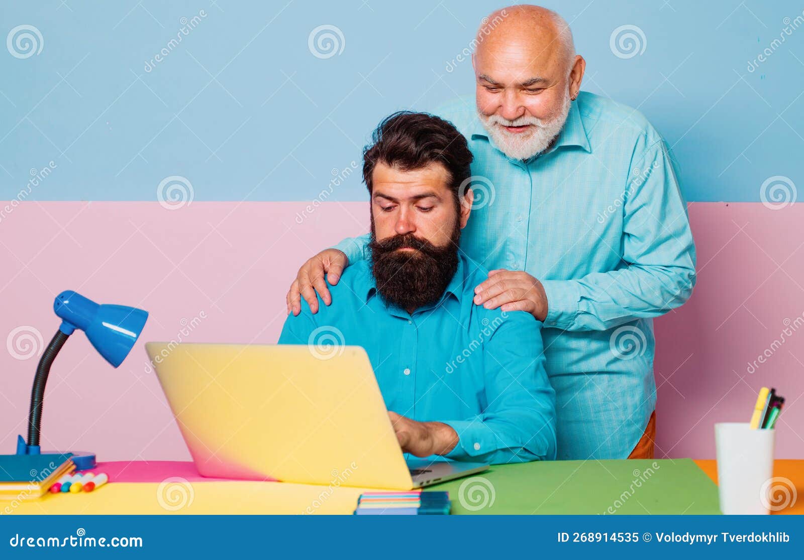 Two Man in Different Ages Working in Office. Old Manager Having ...
