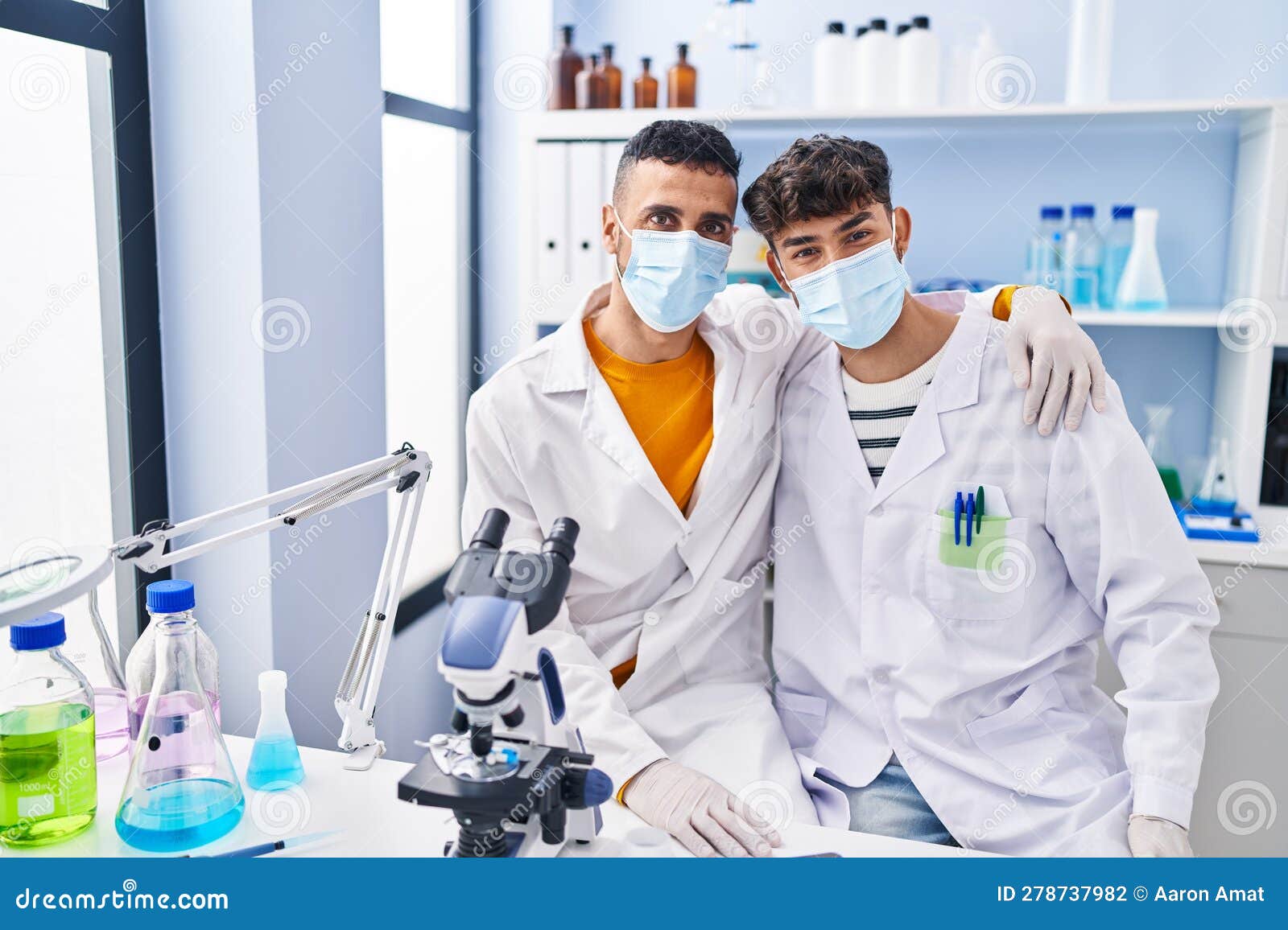 Two Man Scientists Wearing Medical Mask at Laboratory Stock Photo ...