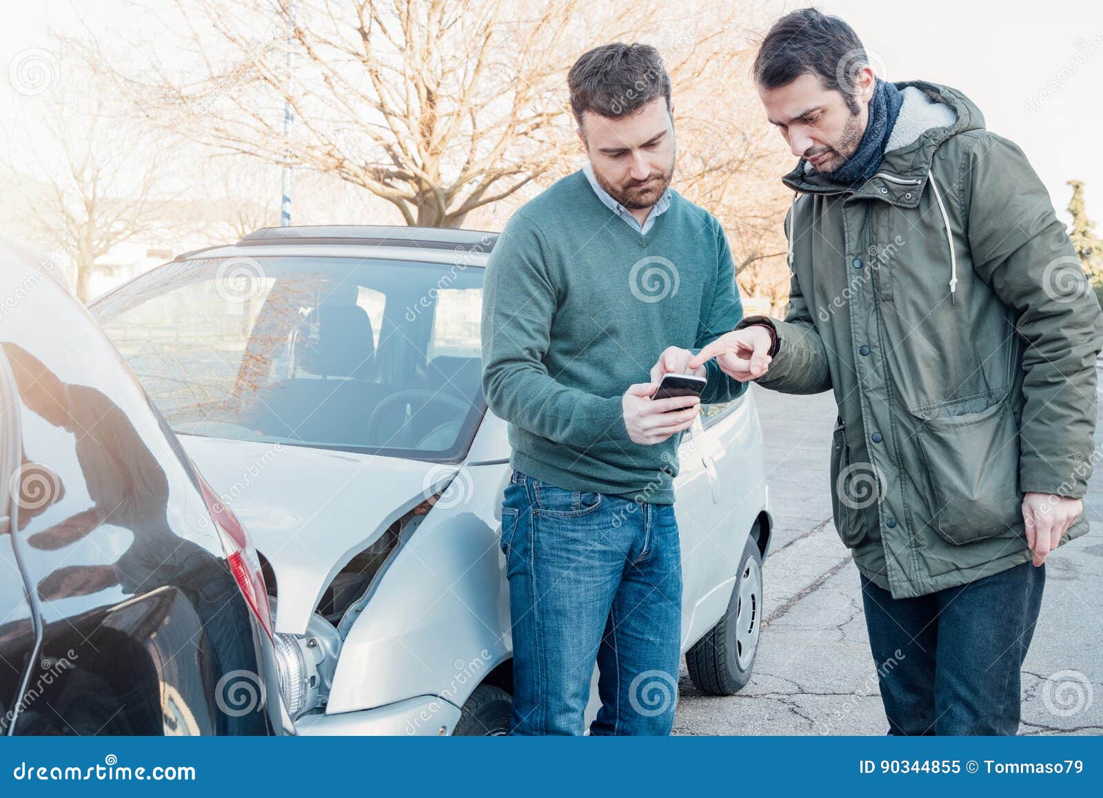 Two Man Using Mobile Phone after a Car Crash Stock Image - Image of ...