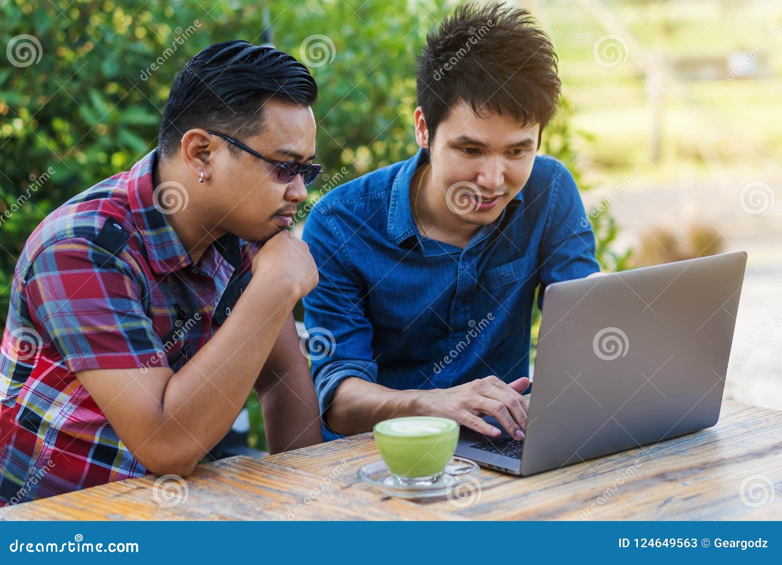 Two Man Using and Working on Laptop Computer Stock Image - Image of ...