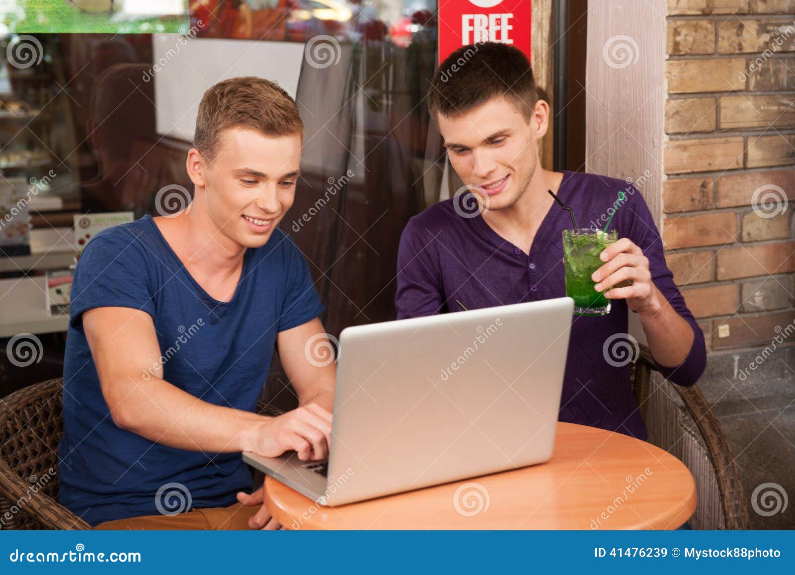Two Man Working on Computer in Cafe. Stock Image - Image of boys ...