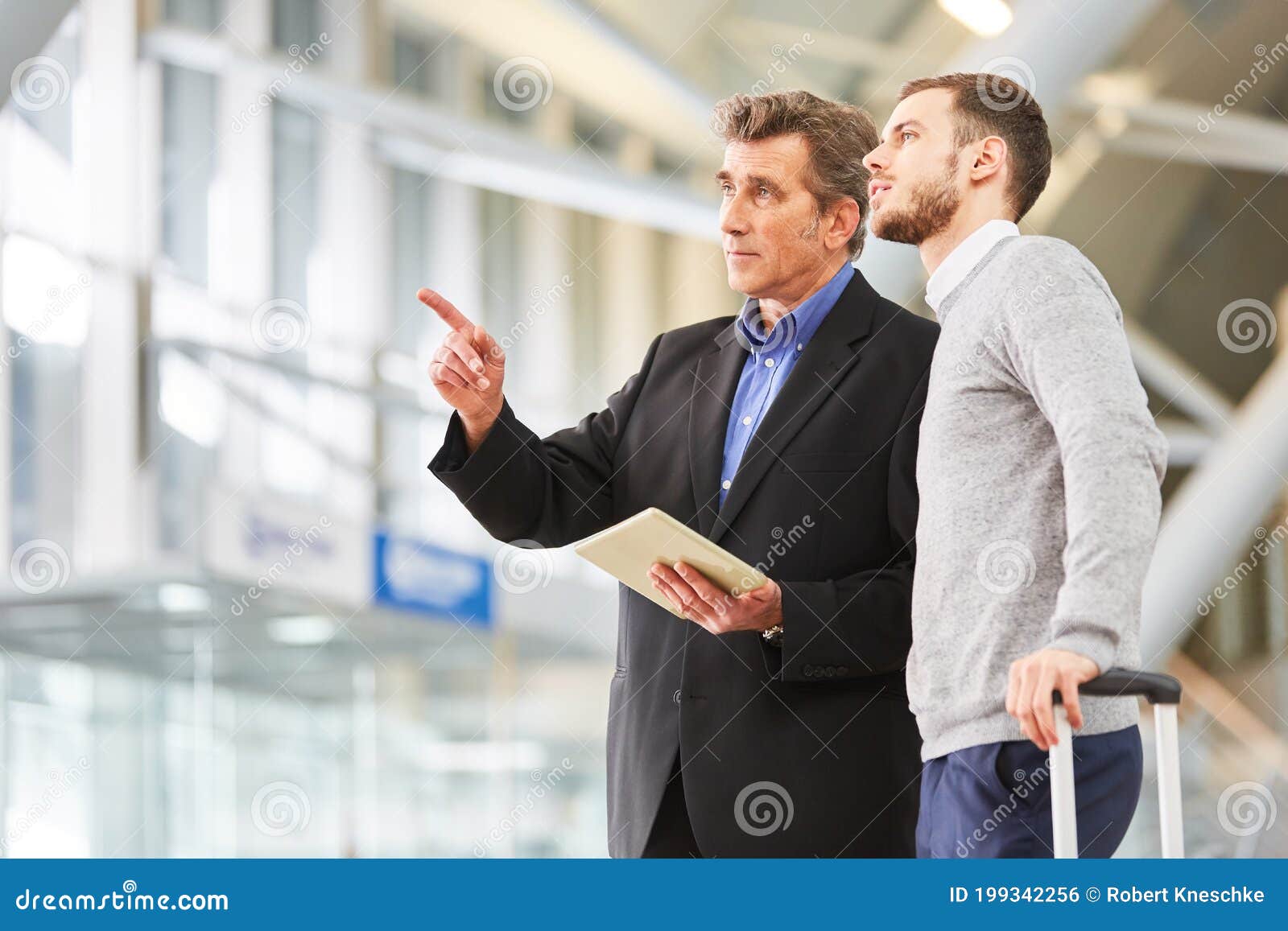 Two Managers before Their Business Trip at the Airport Stock Photo ...