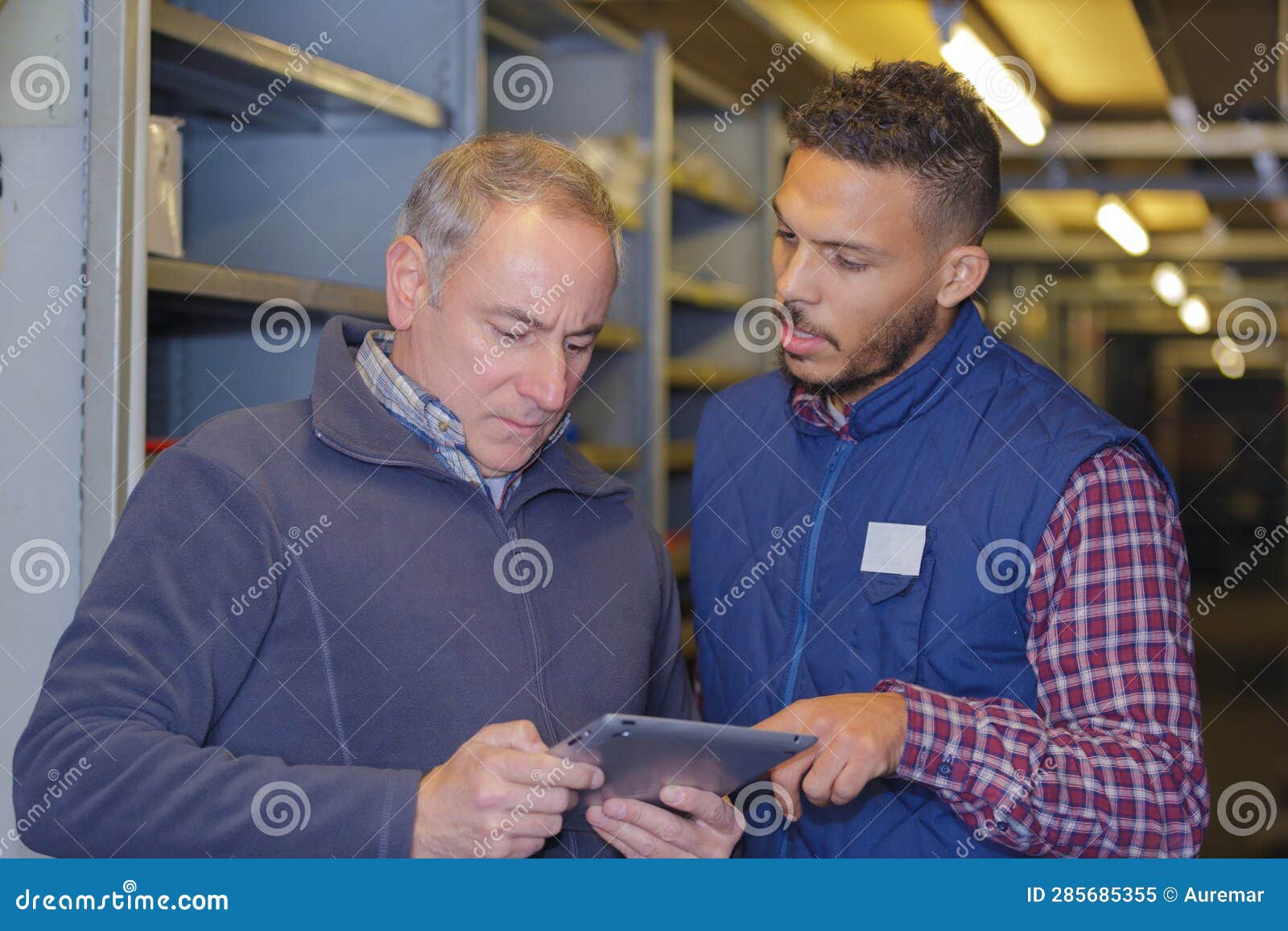 Two Managers Workers in Warehouse with Tablet Computer Stock Image ...