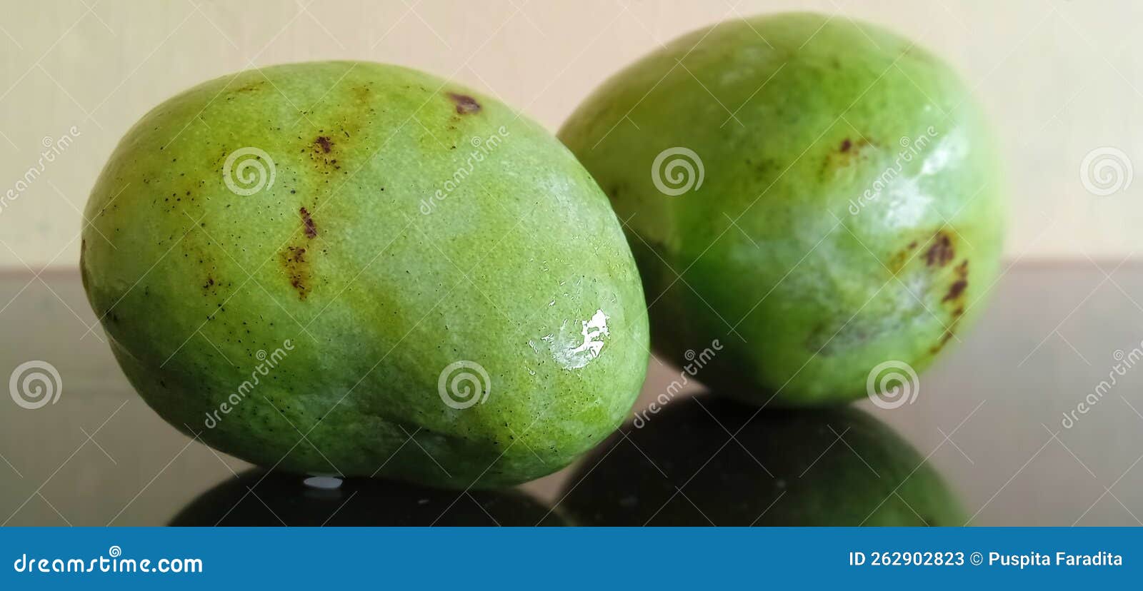 Two mango on the table stock image. Image of fruit, tropical - 262902823